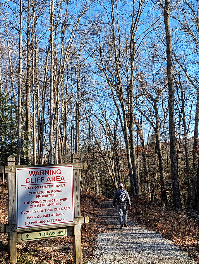 The warning sign stands sentinel at the trailhead &ndash; nature's way of saying "Come play, but remember I'm not your backyard swing set."