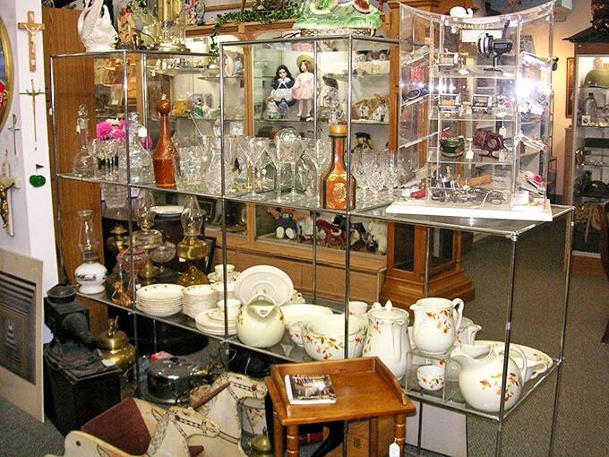 Crystal and glassware catching the light like diamonds in a cave. Each piece has toasted celebrations and witnessed conversations now lost to time.