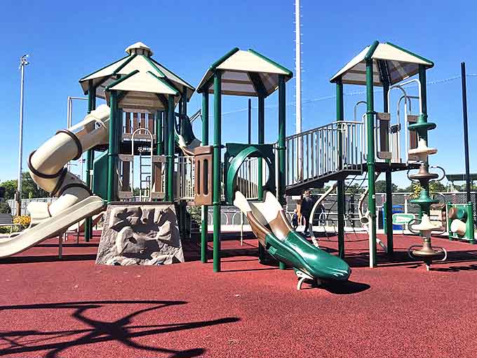 The Recreation Complex's colorful playground equipment promises hours of fun, where kids can climb, slide, and burn off enough energy to sleep tonight.