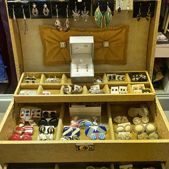 Vintage jewelry awaits new wrists and necks in this treasure chest display &ndash; each compartment holding decades of style waiting for their second act.