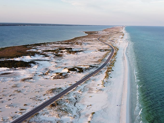 From above, the narrow ribbon of Highway 399 threads between two bodies of water, like nature's perfect balancing act.