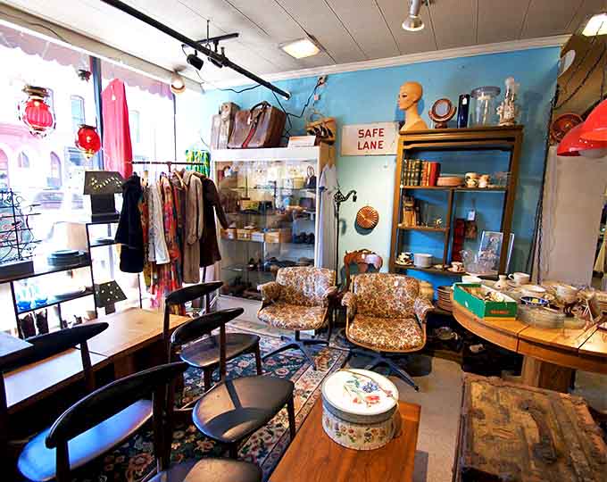 This booth looks like someone's eccentric great-aunt decided to display her entire life collection &ndash; organized chaos at its most charming.