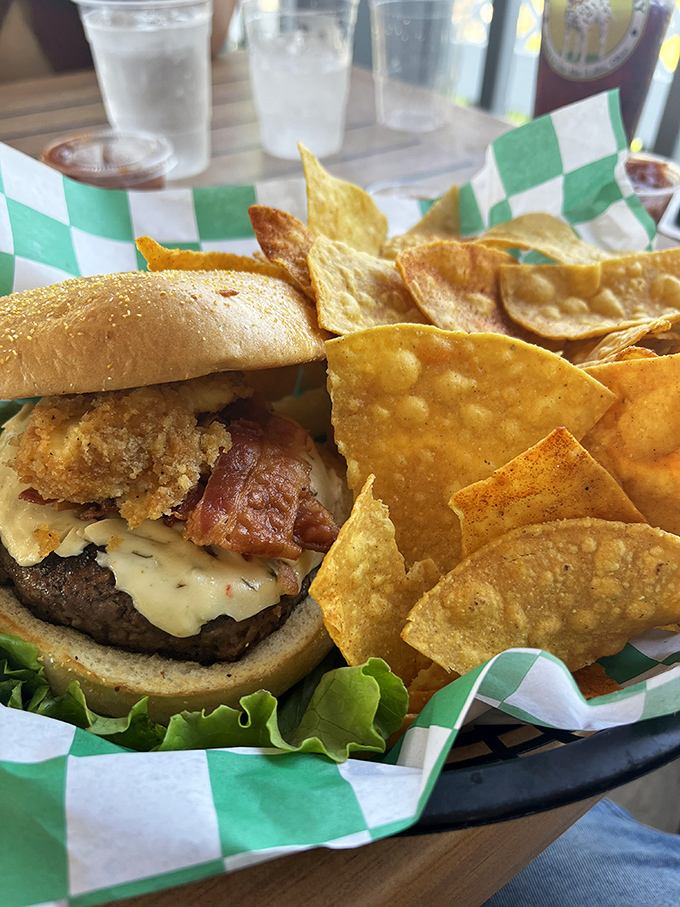This isn't just any burger &ndash; it's a masterpiece of bacon, cheese, and crispy toppings that makes wine pairing feel like a delicious duty.