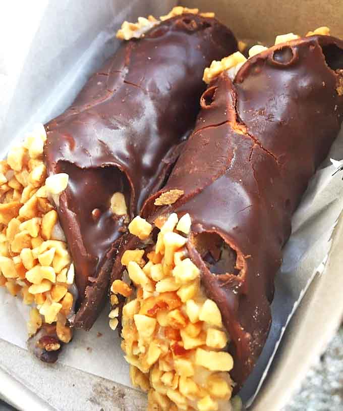 These chocolate-dipped cannoli aren't just desserts&mdash;they're edible architecture with that perfect shell crunch giving way to creamy, sweet ricotta filling.