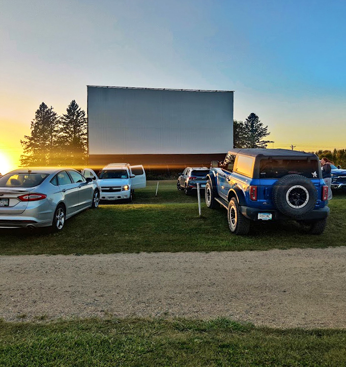 Cars line up in anticipation, each vehicle a private theater box with the best seats determined by who arrives earliest.