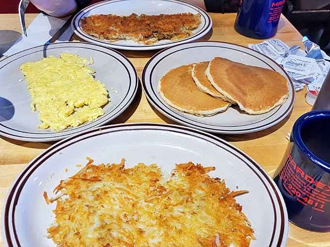 A classic breakfast spread that would make any pilot proud &ndash; golden pancakes, fluffy eggs, and hash browns crispy enough to hear from the cockpit.