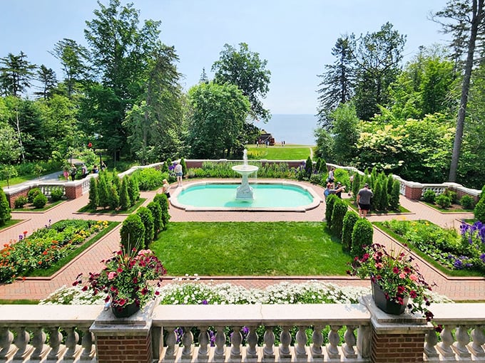 The formal gardens create an outdoor living room, where the fountain's gentle splash provides nature's soundtrack to afternoon tea and gossip.