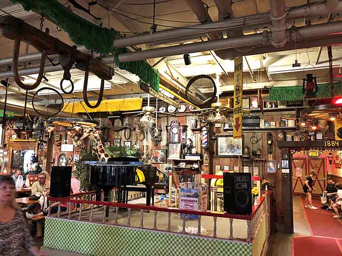 A symphony of vintage instruments awaits new musicians&mdash;guitars hanging like ripening fruit, while a piano invites impromptu performances from passing shoppers.