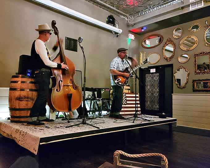 The rhythm section takes the stage &ndash; Musicians breathe life into classic jazz standards, their notes floating upward to dance across that magnificent tin ceiling.