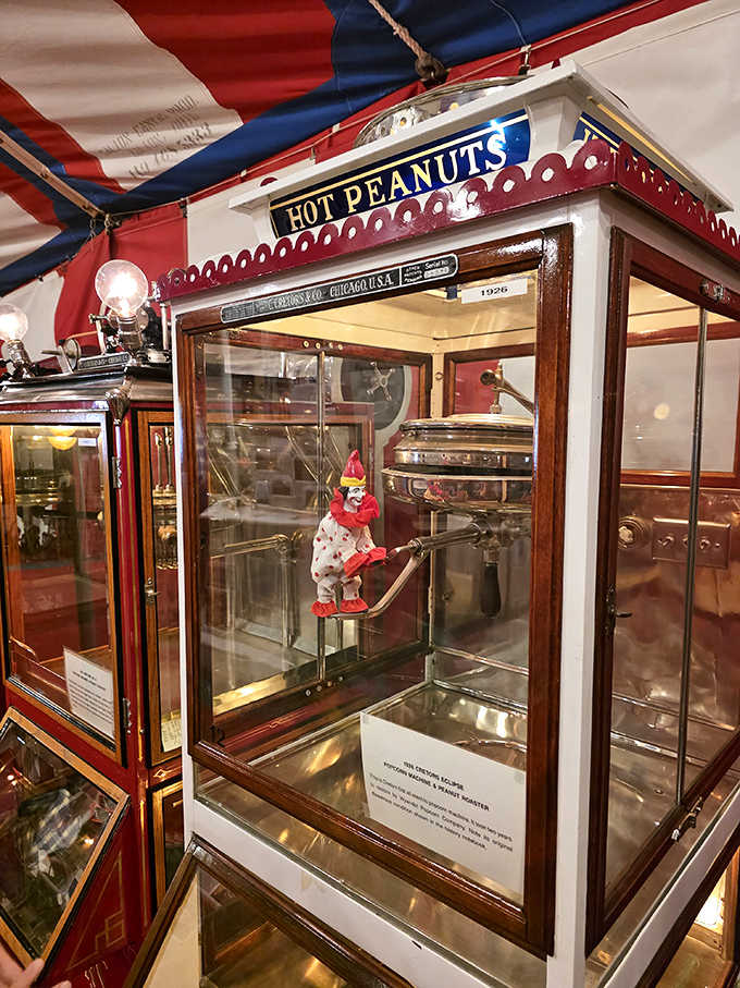 Hot peanuts and childhood memories! This 1926 roaster features a playful mechanical clown, reminding us when snack food was equal parts treat and entertainment.
