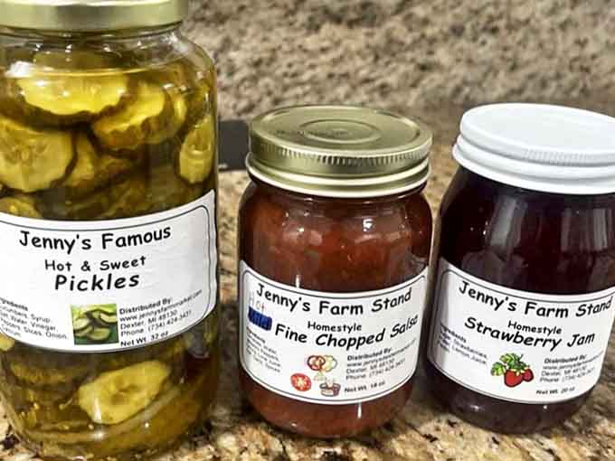 Mason jars of culinary magic &ndash; Jenny's famous pickles, homestyle salsa, and strawberry jam capture seasons in glass.