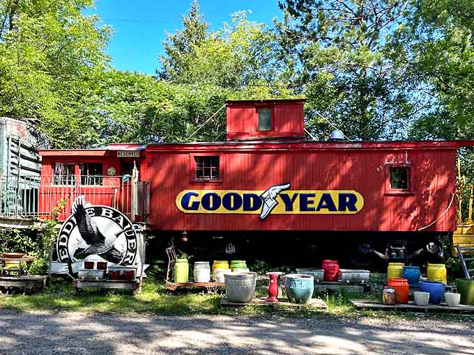 All aboard the imagination express! This vibrant red Goodyear caboose has found its forever home among the trees of Petticoat Junction.