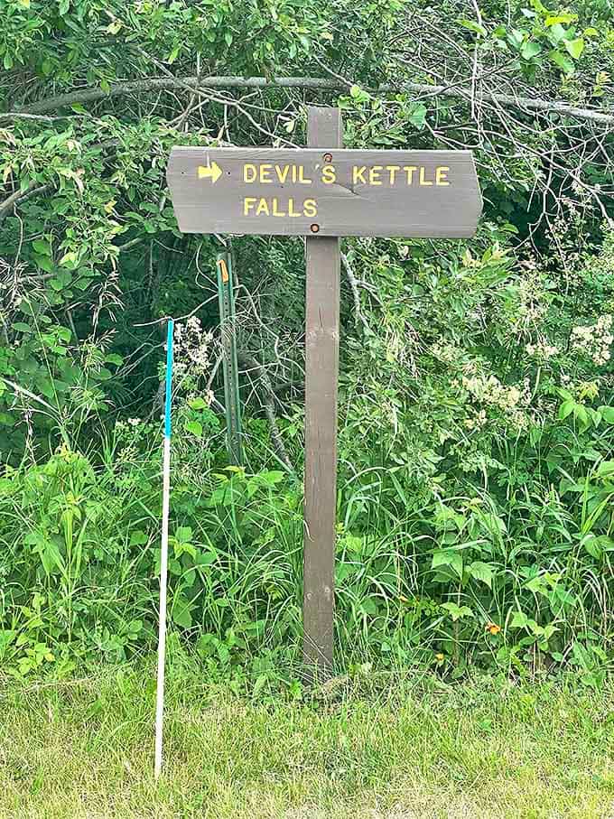 Devil's Kettle Falls &ndash; the sign points the way to Minnesota's most puzzling natural phenomenon, promising adventure just around the corner.