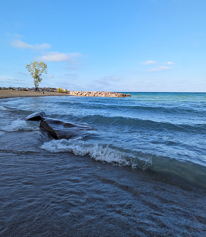 Gentle waves lap against the shore, nature's own meditation soundtrack that instantly lowers blood pressure and raises spirits. Who needs a spa when you have this?