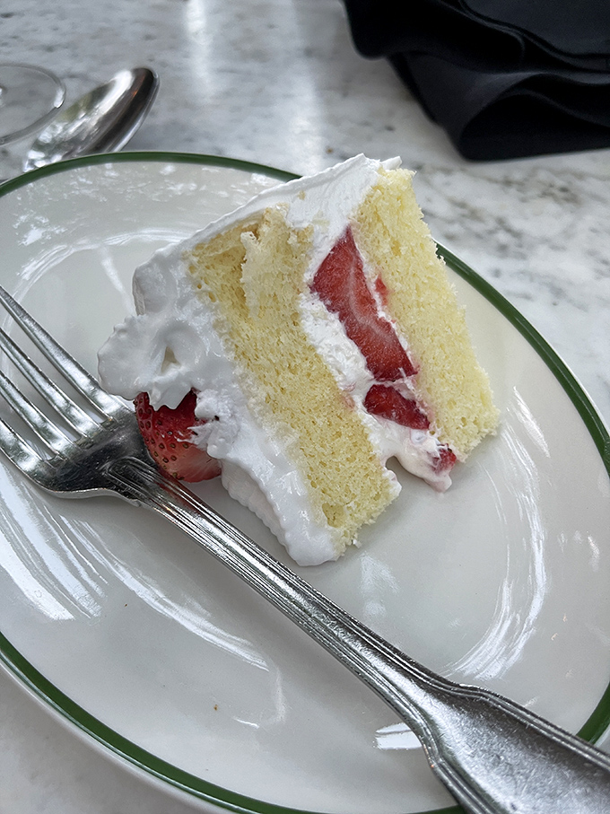 The star attraction in all its glory &ndash; a perfect slice of strawberry cake with plump berries nestled between layers of cloud-like vanilla cake.