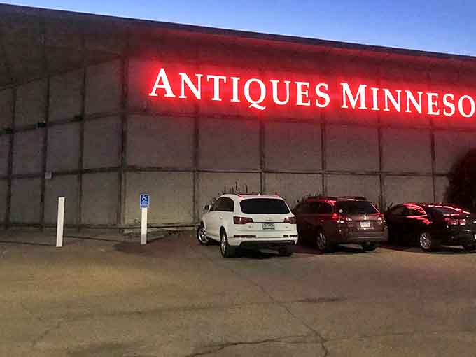 Explore endless vintage treasures and unique collectibles under the glowing neon lights of Antiques Minnesota, a friendly haven for shoppers.