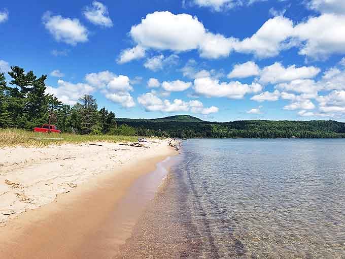 Bete Grise Bay curves gently along the Keweenaw Peninsula, its Caribbean-blue waters and white sands creating a tropical mirage in Michigan's north.