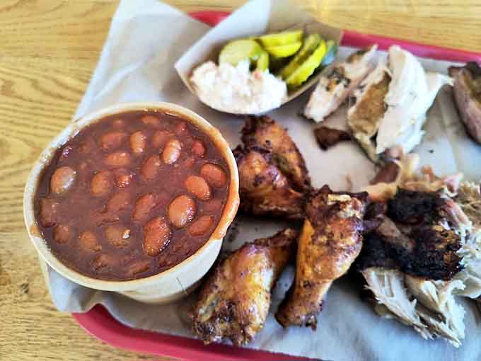 These aren't your average baked beans. Rich, sweet-savory pods swimming alongside bits of pork in a sauce worth licking clean.