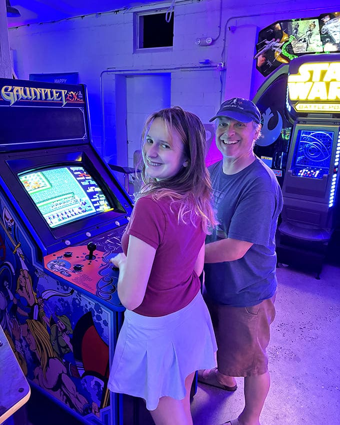 The joy of arcade gaming is best when shared, creating bonds across generations through the universal language of "just one more game."