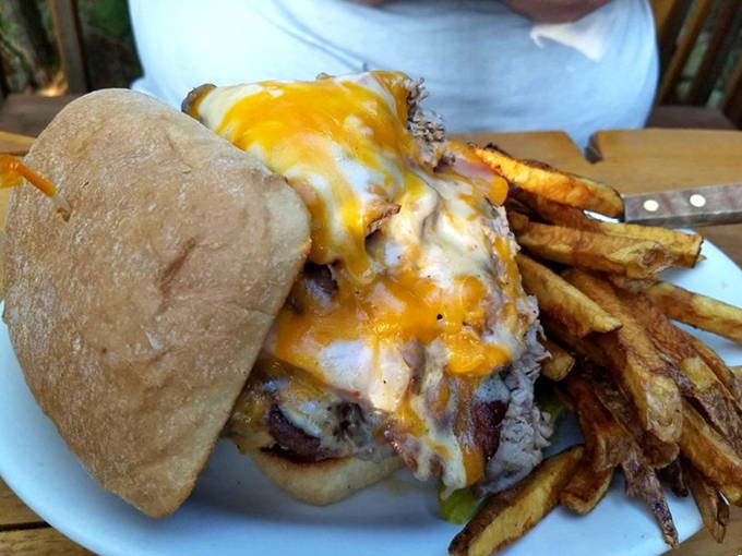 The Backpacker's burger stands tall and proud, ready to refuel hungry hikers with its mountain of toppings and hand-cut fries.