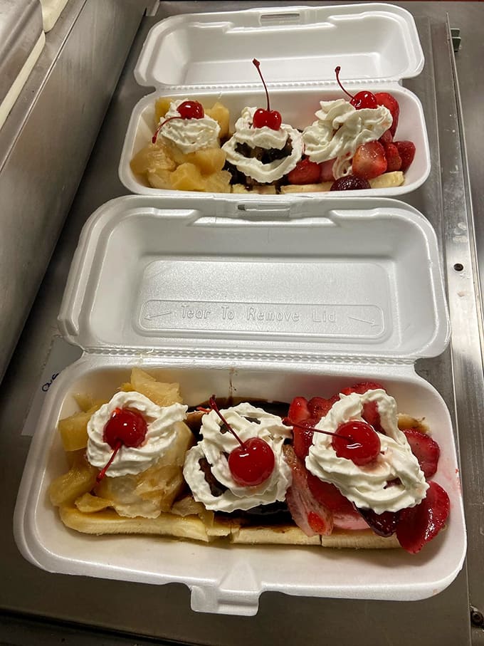 Banana split nirvana! Whipped cream cascading over ice cream mountains with that perfect drizzle of caramel and crunchy toppings.