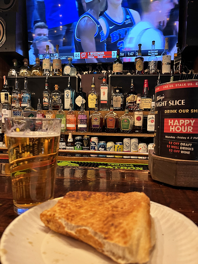 The bar counter gleams with promise as sports play overhead &ndash; where craft beer flows freely and cocktails are mixed with scientific precision.