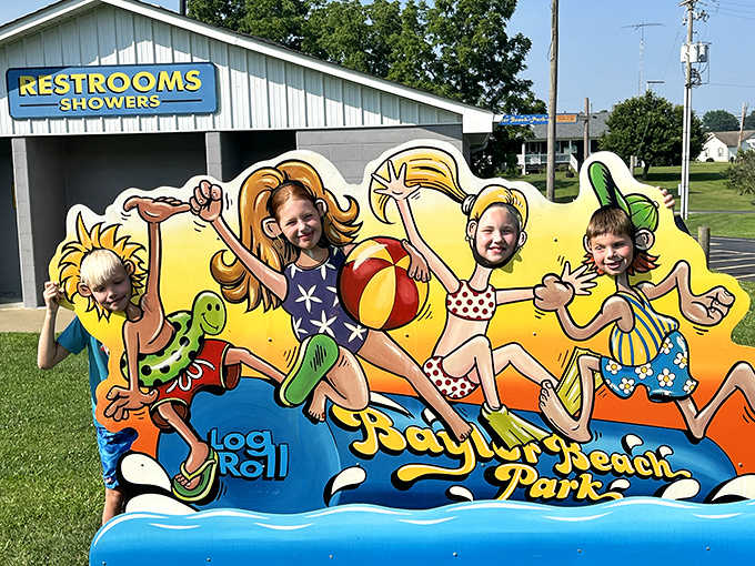 The colorful photo prop wall where kids pose as cartoon swimmers – creating those mandatory vacation photos parents treasure forever.