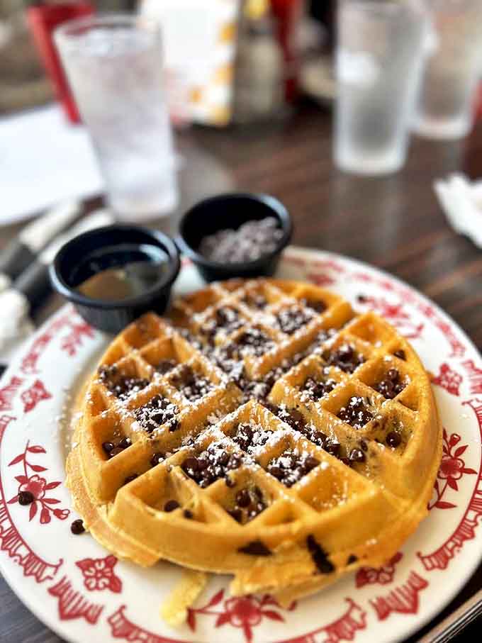 Chocolate chip Belgian waffle perfection &ndash; crispy edges, fluffy interior, and chocolate in every bite. Diet plans surrender at first sight.
