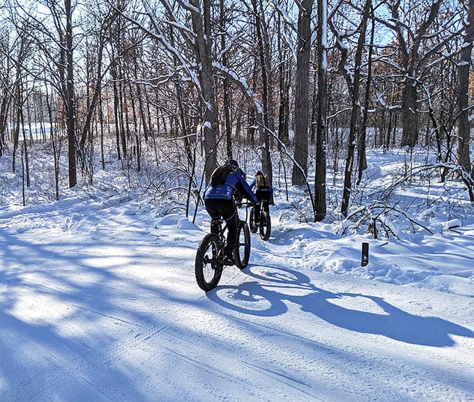 Fat-tire adventurers carve fresh tracks through pristine snow, proving Minnesota winters aren't for hibernating &ndash; they're for exploring.