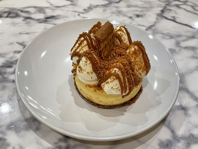 This Biscoff cheesecake isn't just dessert &ndash; it's therapy on a plate, with cookie crumbles and caramel drizzle that could solve world peace.