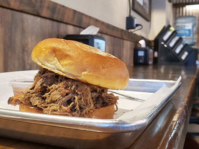 A monument to patience and skill &ndash; perfectly smoked beef with that coveted pink ring nestled in a brioche embrace.