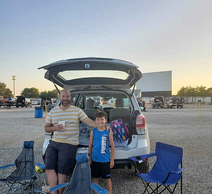 Tailgate movie viewing perfected &ndash; camping chairs, coolers, and conversation create the pre-show entertainment that streaming services can't replicate.