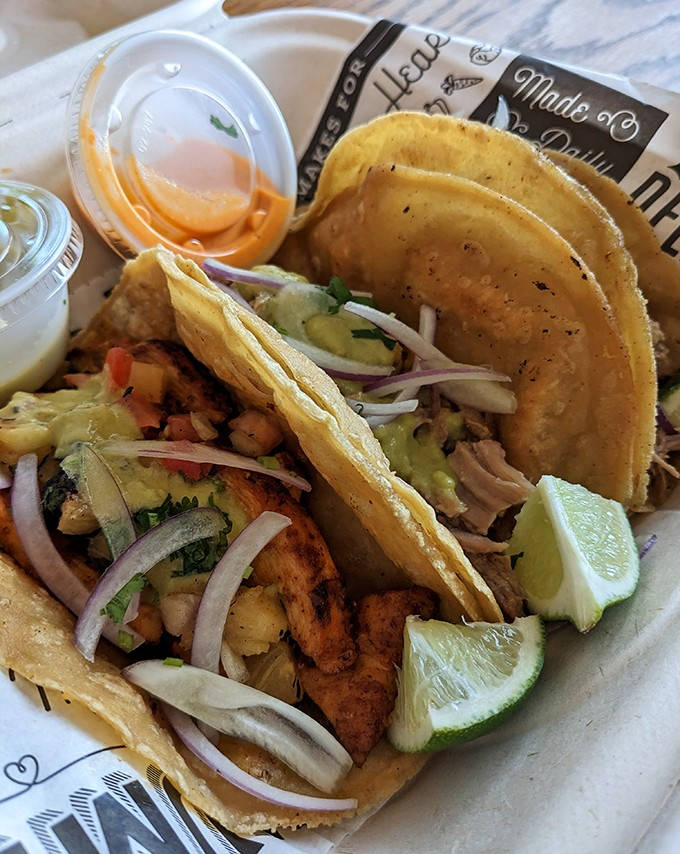 Slow-cooked pork perfection nestled in corn tortillas &ndash; each bite delivers crispy edges and tender centers with zesty lime brightness.