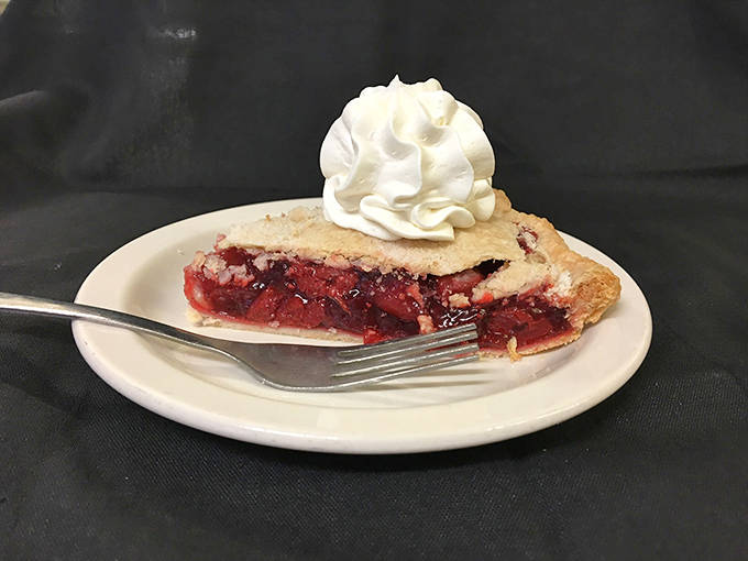 Cherry pie that strikes that perfect sweet-tart balance, topped with a dollop of whipped cream that melts into all the right places.