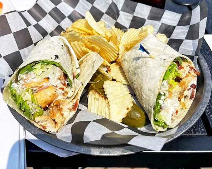 This isn't your sad desk lunch wrap &ndash; the Chicken Caesar bursts with fresh greens and perfectly seasoned chicken, making even salad skeptics reconsider their position.