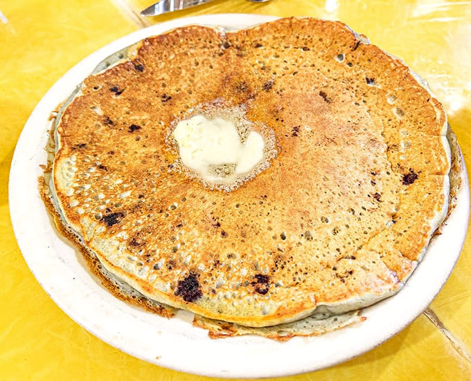 Chocolate chip pancakes at Al's aren't just breakfast, they're dessert with permission – each bite delivering warm, melty pockets of chocolate bliss.