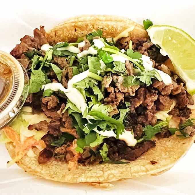 Behold the Churrasquitos &ndash; street tacos that got dressed up for a night out, topped with fresh cilantro and a squeeze of lime.