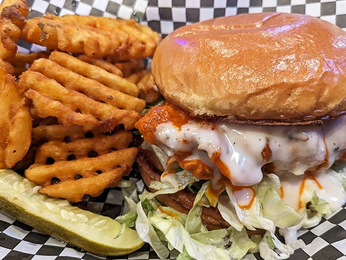The "Cluck Norris" doesn't just kick flavor into high gear &ndash; it roundhouse kicks your taste buds with buffalo sauce and blue cheese.