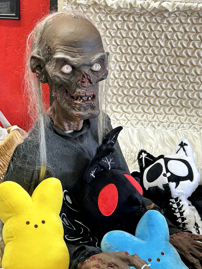 The Crypt Keeper surrounded by colorful Peeps is either brilliant commentary on mortality or someone's twisted Easter display, possibly both at once.