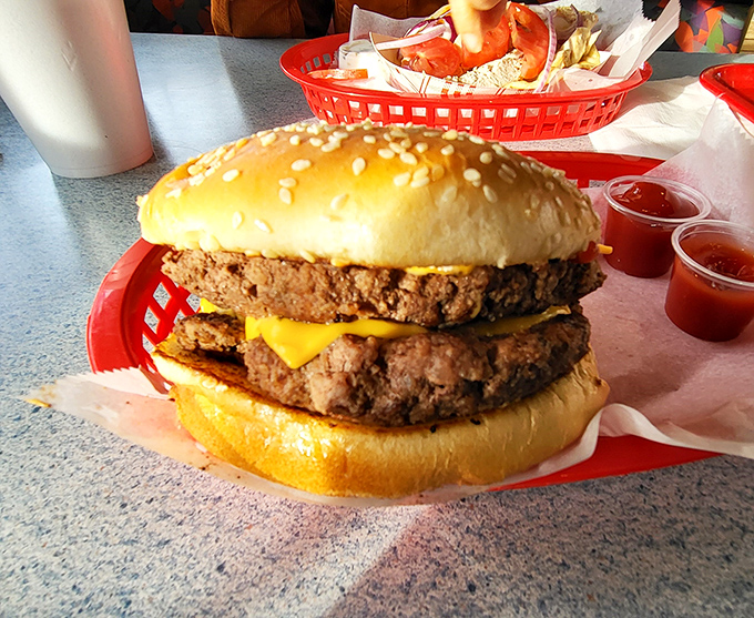 The Big Bomber burger &ndash; a towering testament to American ingenuity where two patties meet cheese in perfect harmony.
