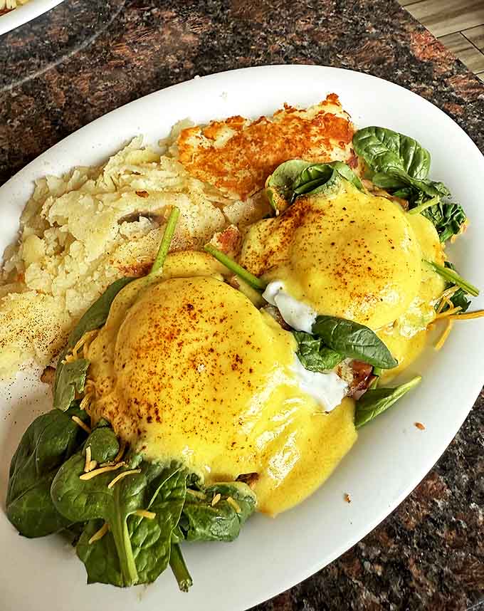 Eggs Florentine brings sophistication to the breakfast table, with perfectly poached eggs and hollandaise sauce that would make Julia Child proud.