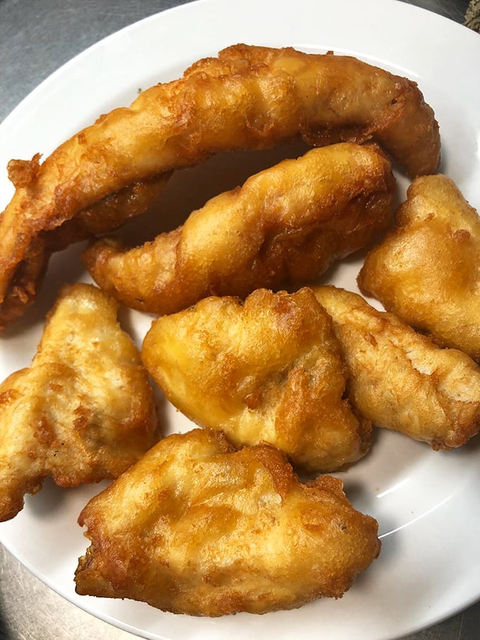 Golden-battered fish fillets that crackle with each bite, revealing flaky white fish beneath &ndash; the cornerstone of any respectable Wisconsin Friday tradition.