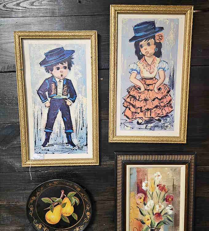 These wide-eyed vintage portraits in ornate frames aren't just art – they're like finding long-lost relatives who dress better than your actual family.