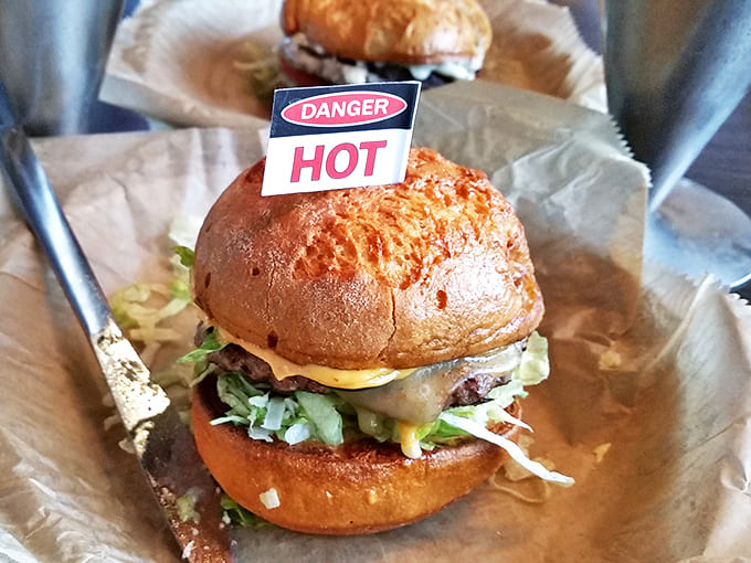 When a burger comes with a "DANGER HOT" warning, you know you're in for a flavor adventure. Spice that bites back, deliciously.