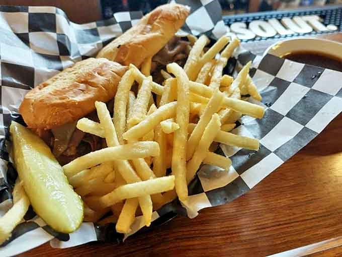 Their French Dip sandwich arrives with golden fries and a pickle &ndash; the perfect fuel for pinball wizards in training.