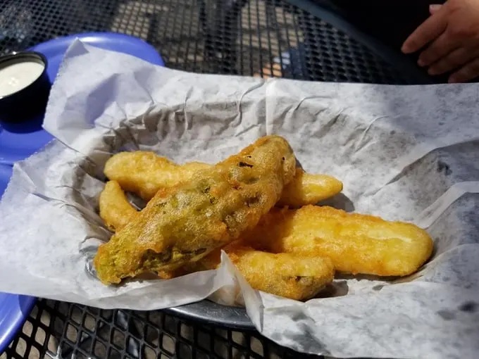Fried pickles that achieve the impossible: maintaining their crunch while delivering that warm, tangy interior that pickle dreams are made of.