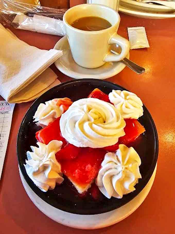 Fresh strawberries and cream arranged like edible art, proving that sometimes the prettiest desserts are also the most delicious.