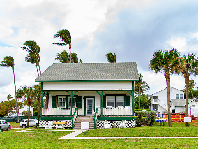 This charming cottage could tell tales of salty air and stormy nights, a slice of Old Florida that survived the condo invasion.