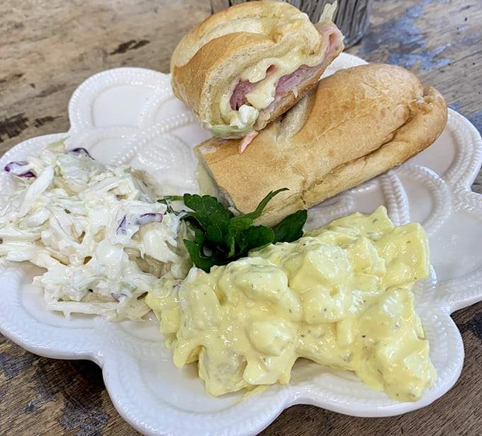The hot ham and Swiss arrives with sides that aren't afterthoughts &ndash; each component on this plate has earned its place through deliciousness.