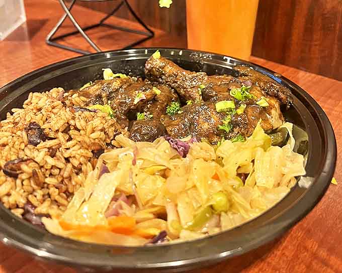 A hearty plate of jerk chicken nestled against golden rice and beans &ndash; the Caribbean's answer to Michigan's winter blues.